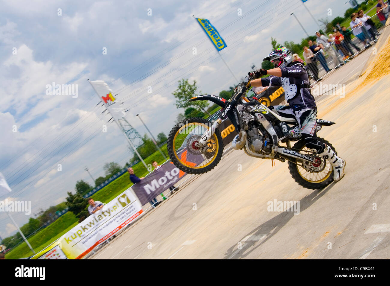 Stunt style - motorcycles trick Stock Photo - Alamy