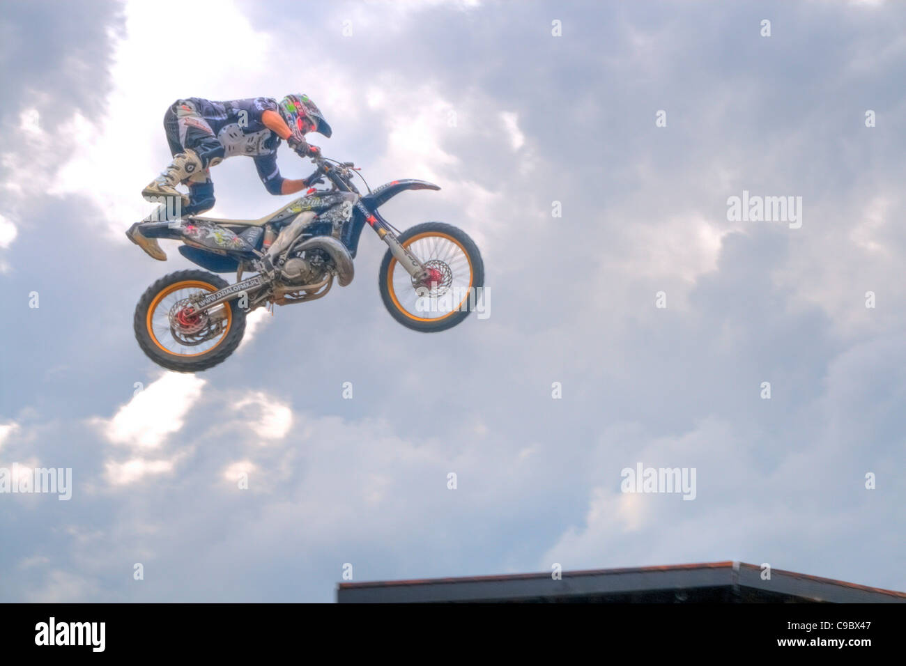 Stunt style - motorcycles trick Stock Photo - Alamy