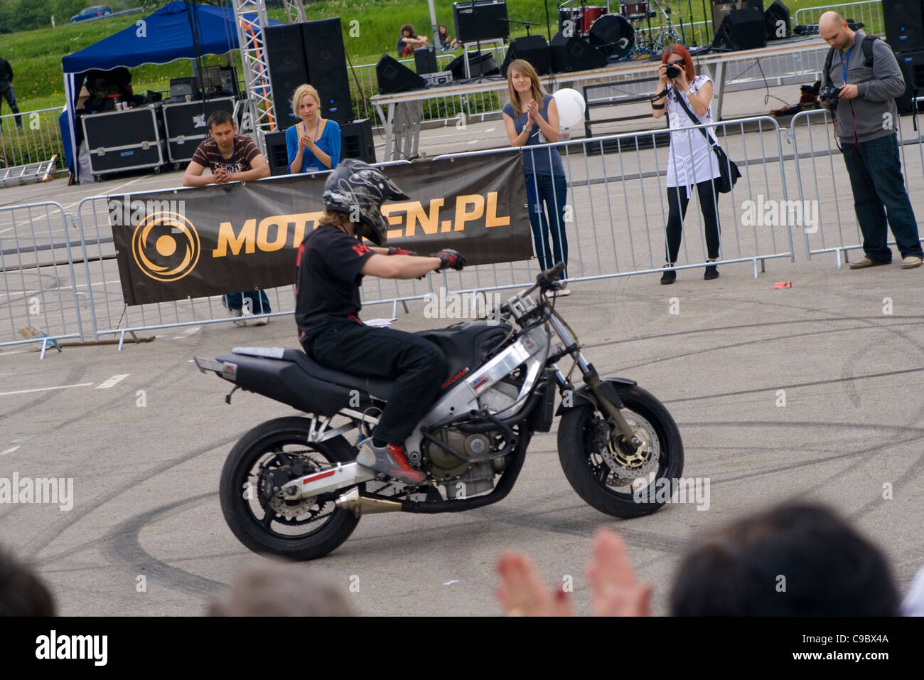 Stunt style - motorcycles trick Stock Photo - Alamy