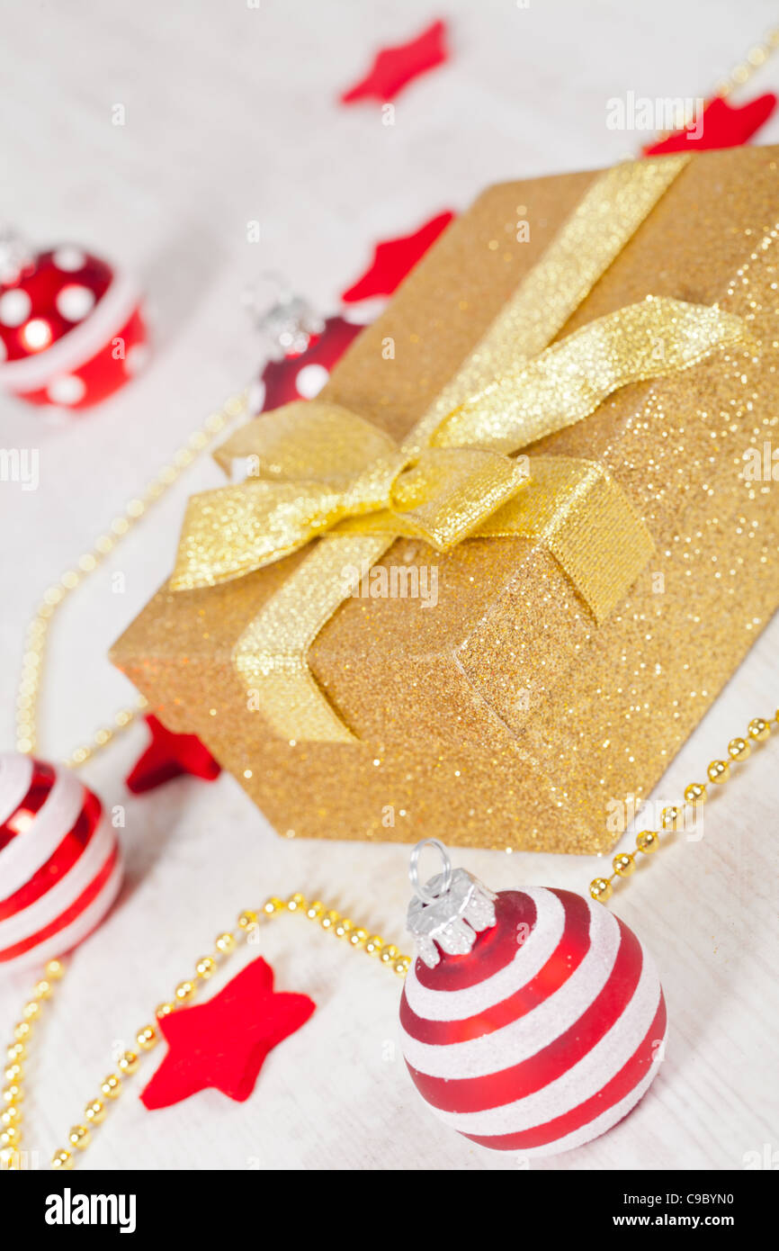 Elegant golden christmas gift pack and decorations Stock Photo - Alamy