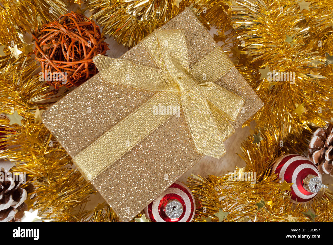 Elegant golden christmas gift pack and decorations Stock Photo - Alamy