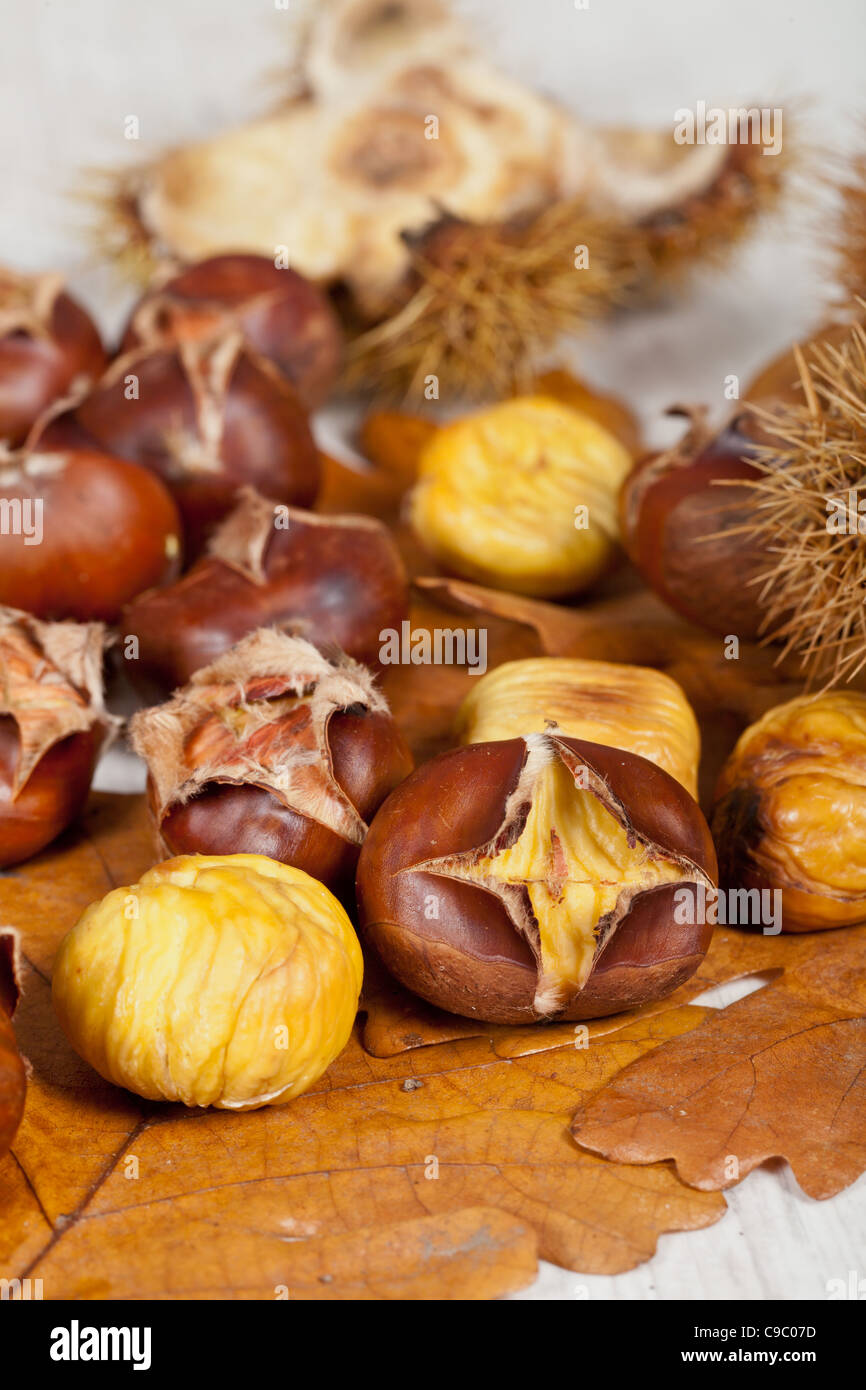Typical delicious warm chestnuts in autumn season Stock Photo - Alamy