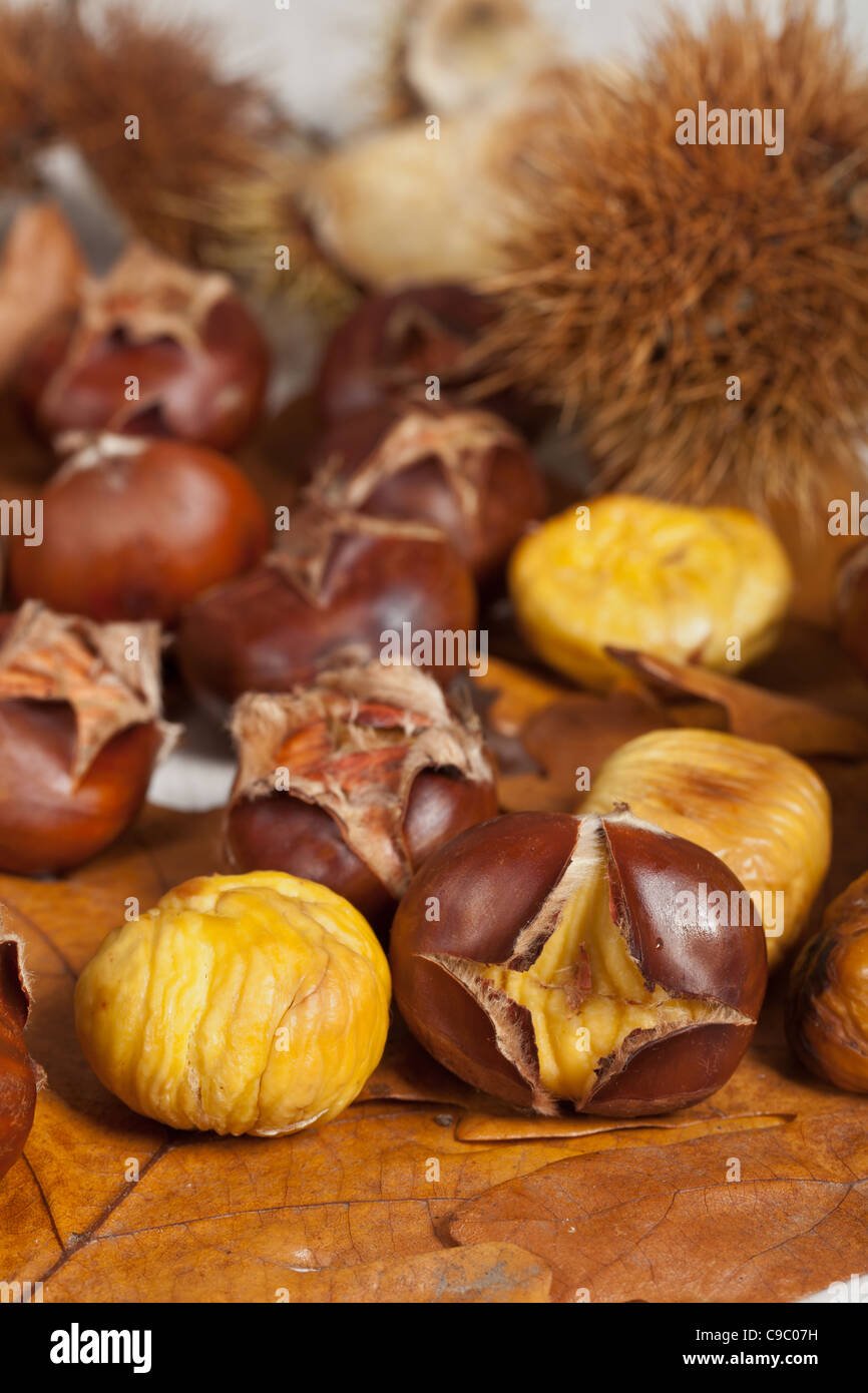 Typical delicious warm chestnuts in autumn season Stock Photo - Alamy