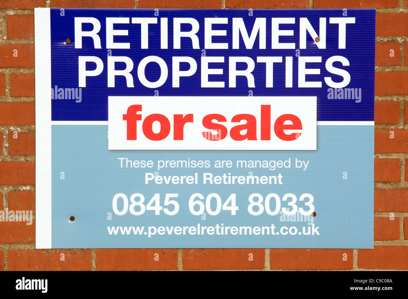 Retirement properties for sale sign Stock Photo - Alamy