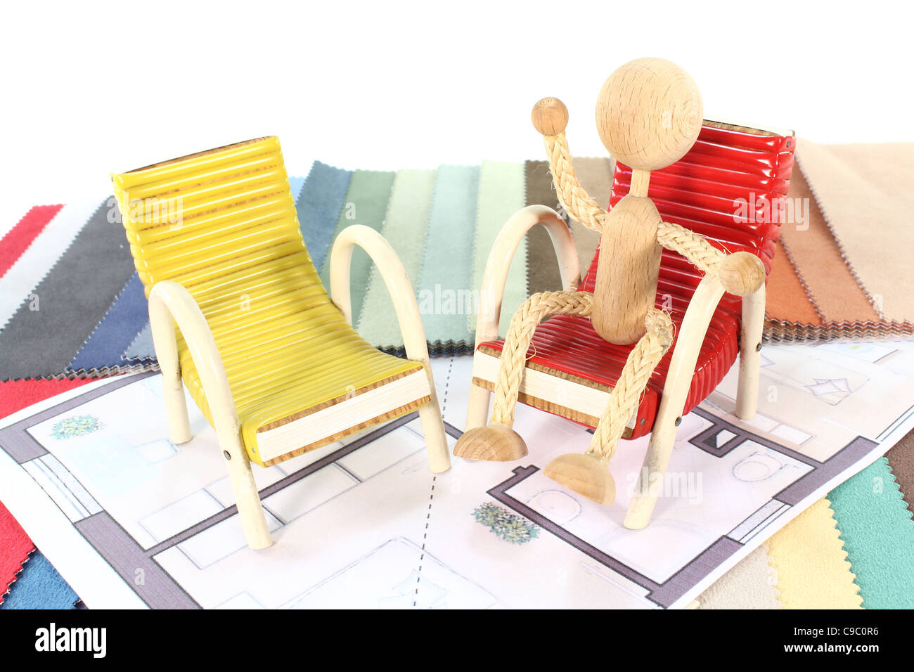 colorful fabric samples with a ground plan of a residential and chair ...