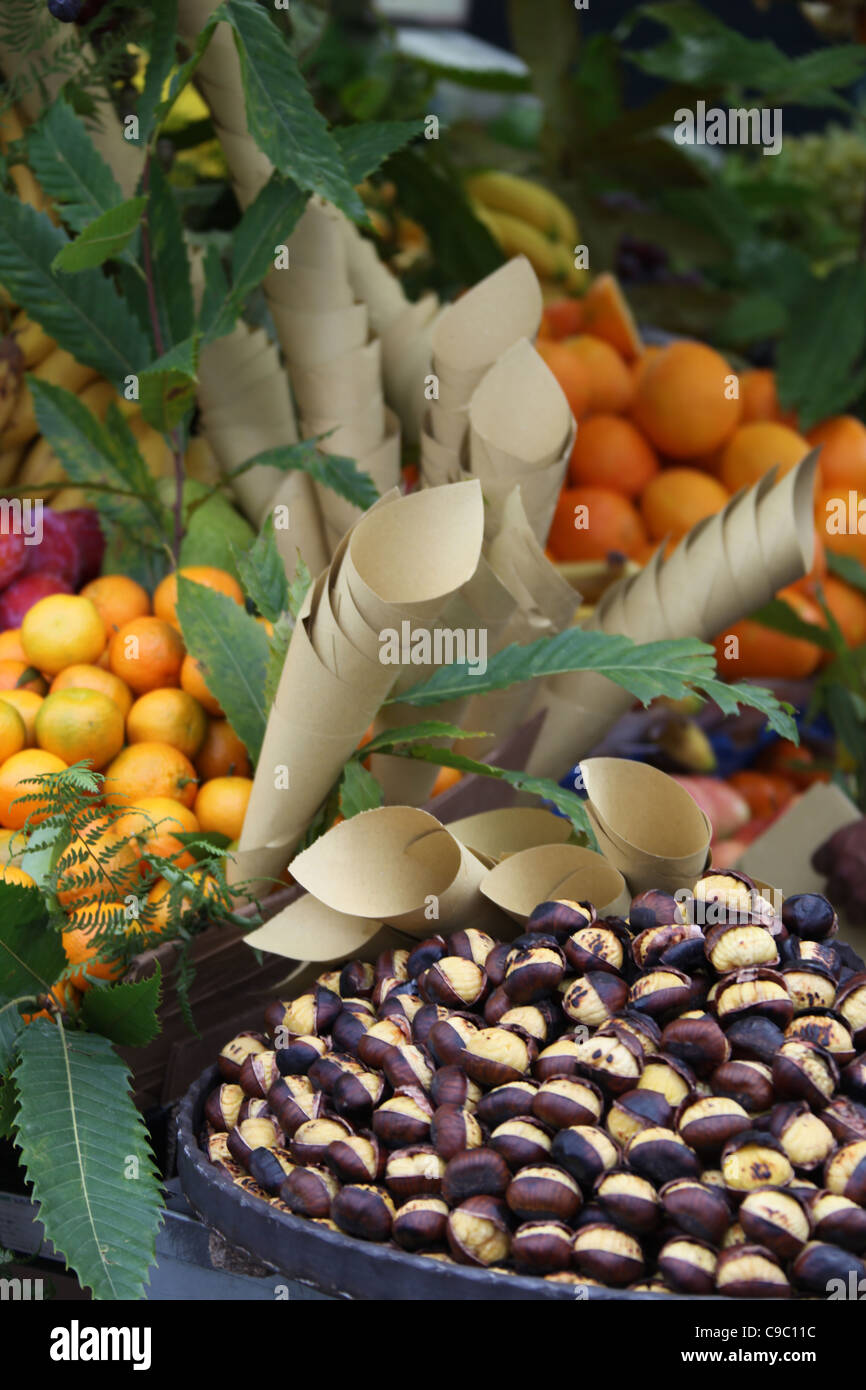 Selling hot roasted chestnuts hi-res stock photography and images - Alamy