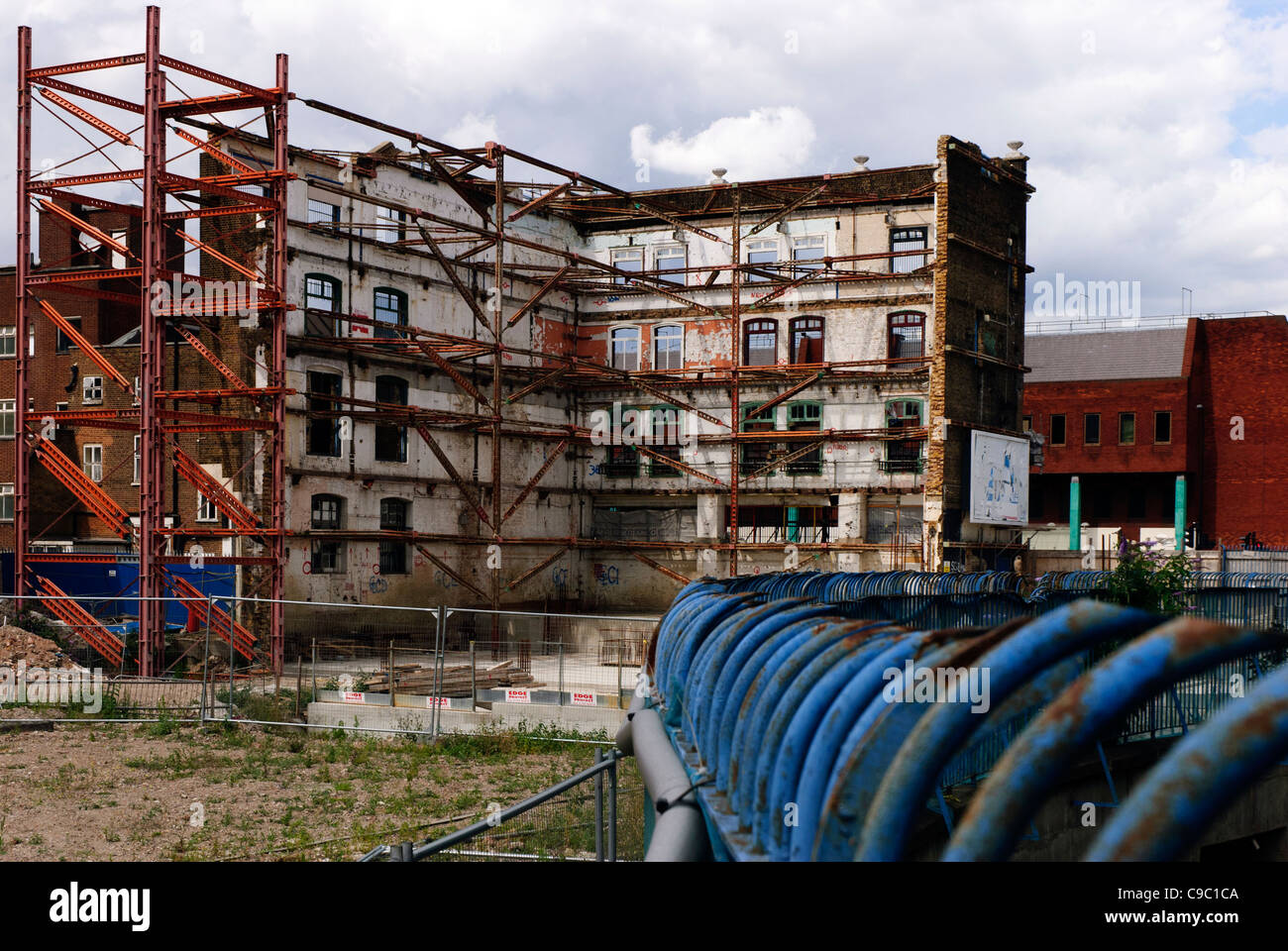 Scaffolding over the shell of the Old Seager Gin Distillery - Deptford ...