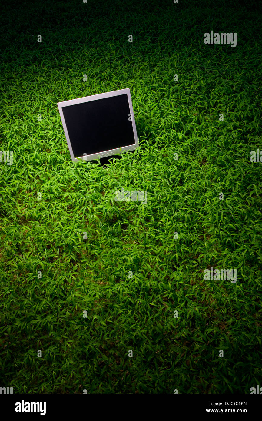 Computer Screen Outside In Grassy Field Stock Photo - Alamy