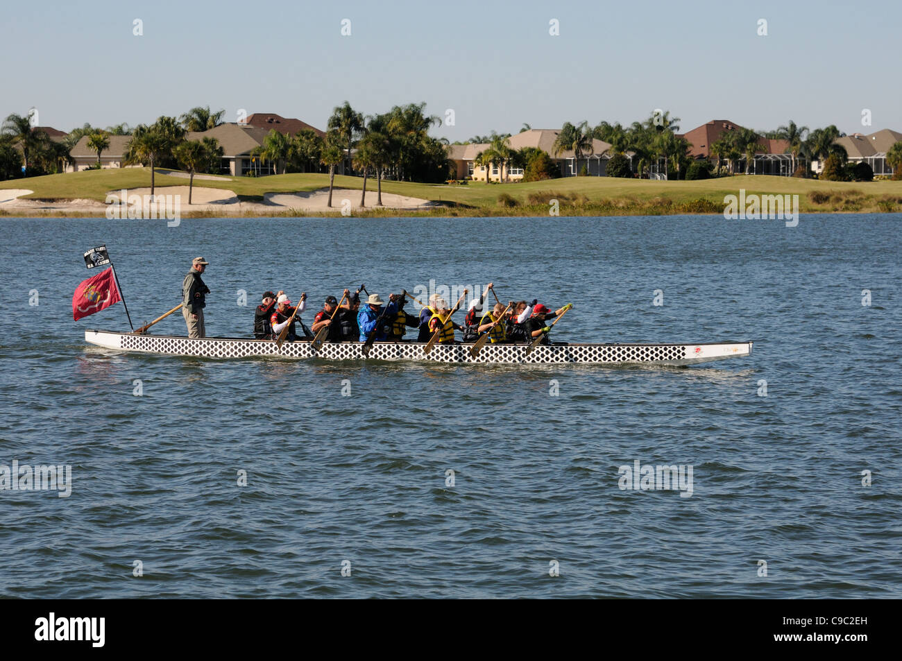 Residents of The Villages homestead in Florida paddle a dragon style ...