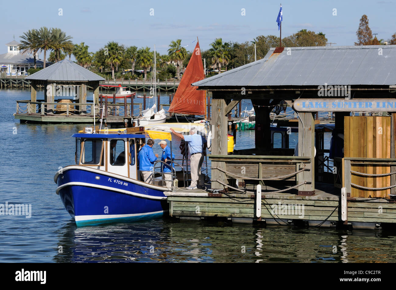 Lake Sumter Line ferryboat docking alongside the pier in The Villages ...