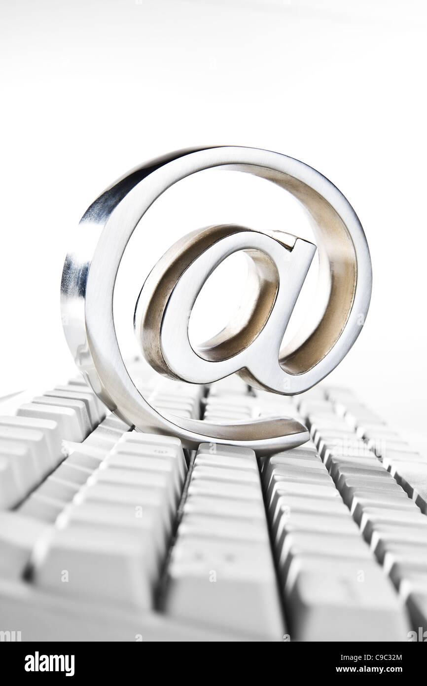 At symbol placed on computer keyboard Stock Photo - Alamy