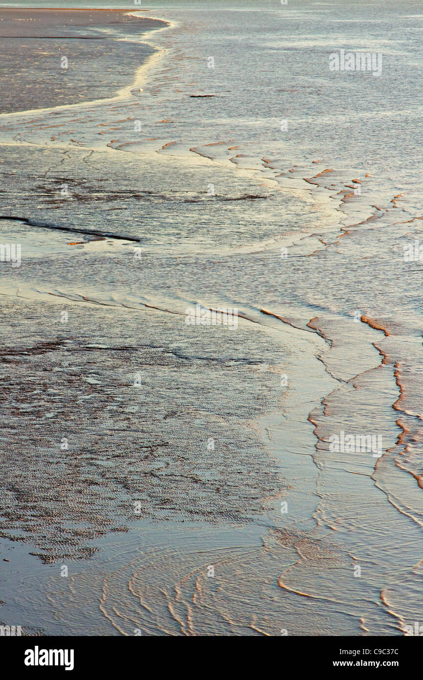 ripples of incoming tide at Liverpool. Merseyside, England UK. November ...