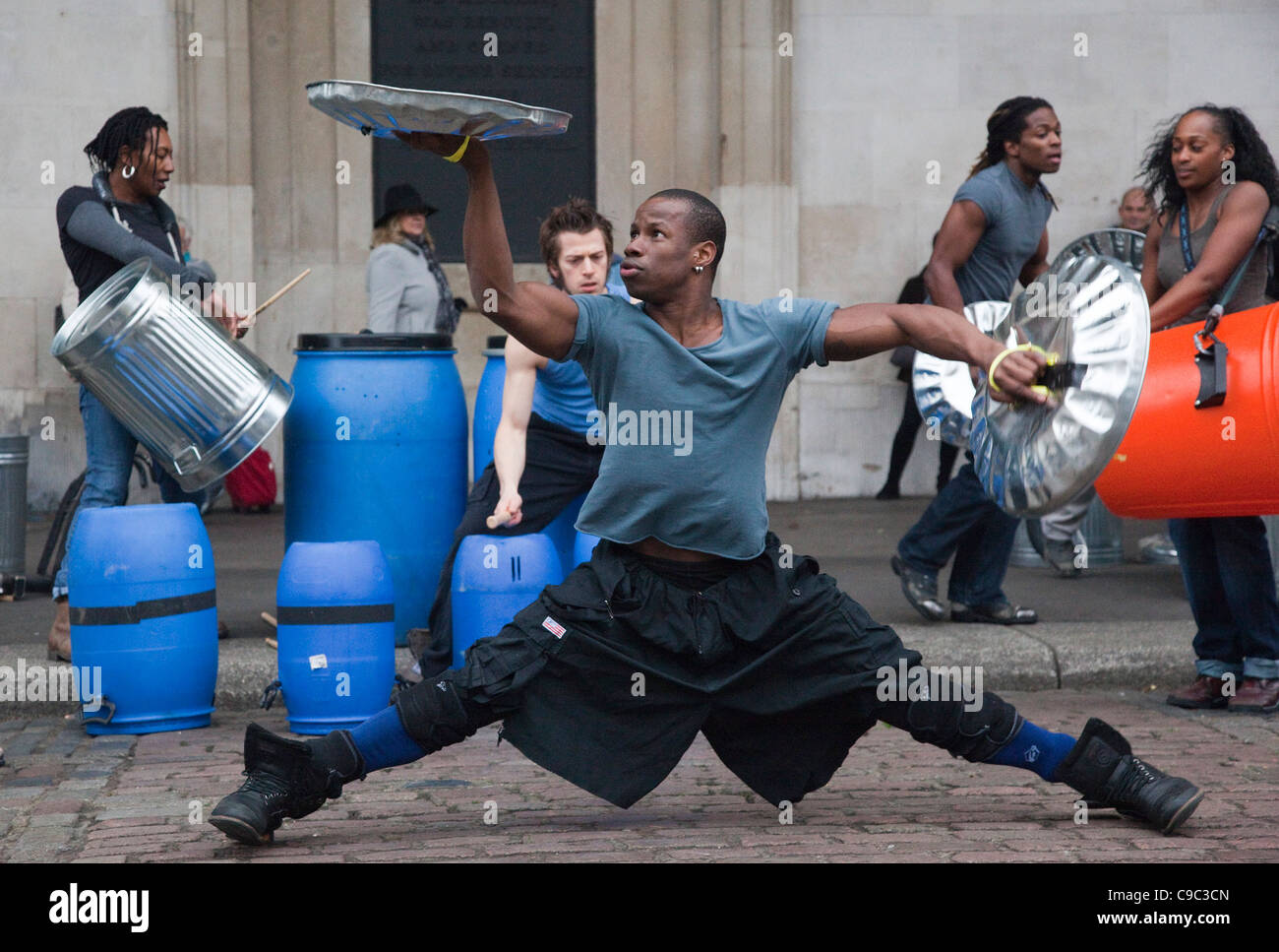 Musical Stomp performed by members of the UK cast to celebrate the 20th ...