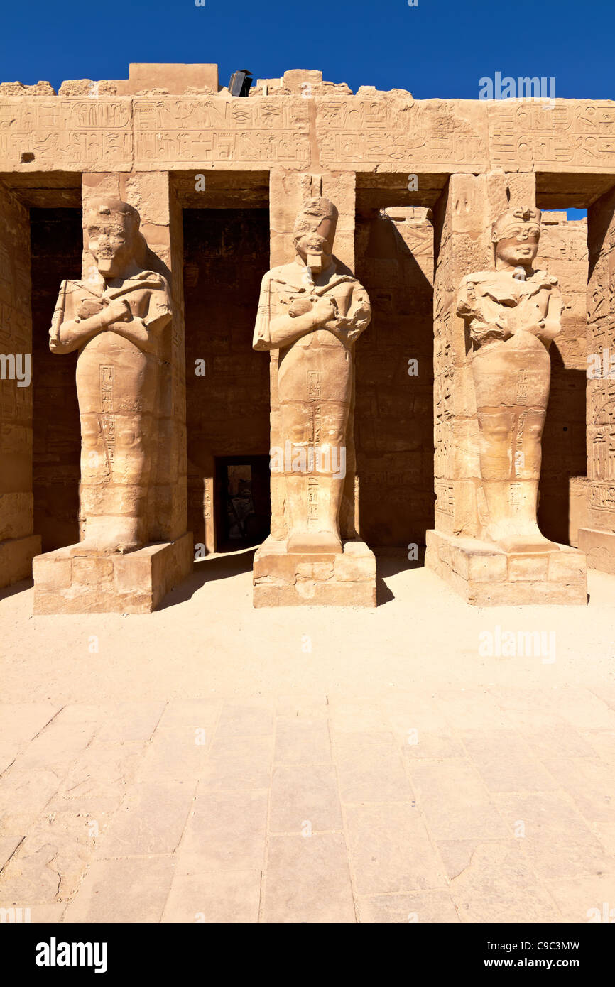 Pharaoh statues in ancient Karnak temple, Egypt Stock Photo - Alamy