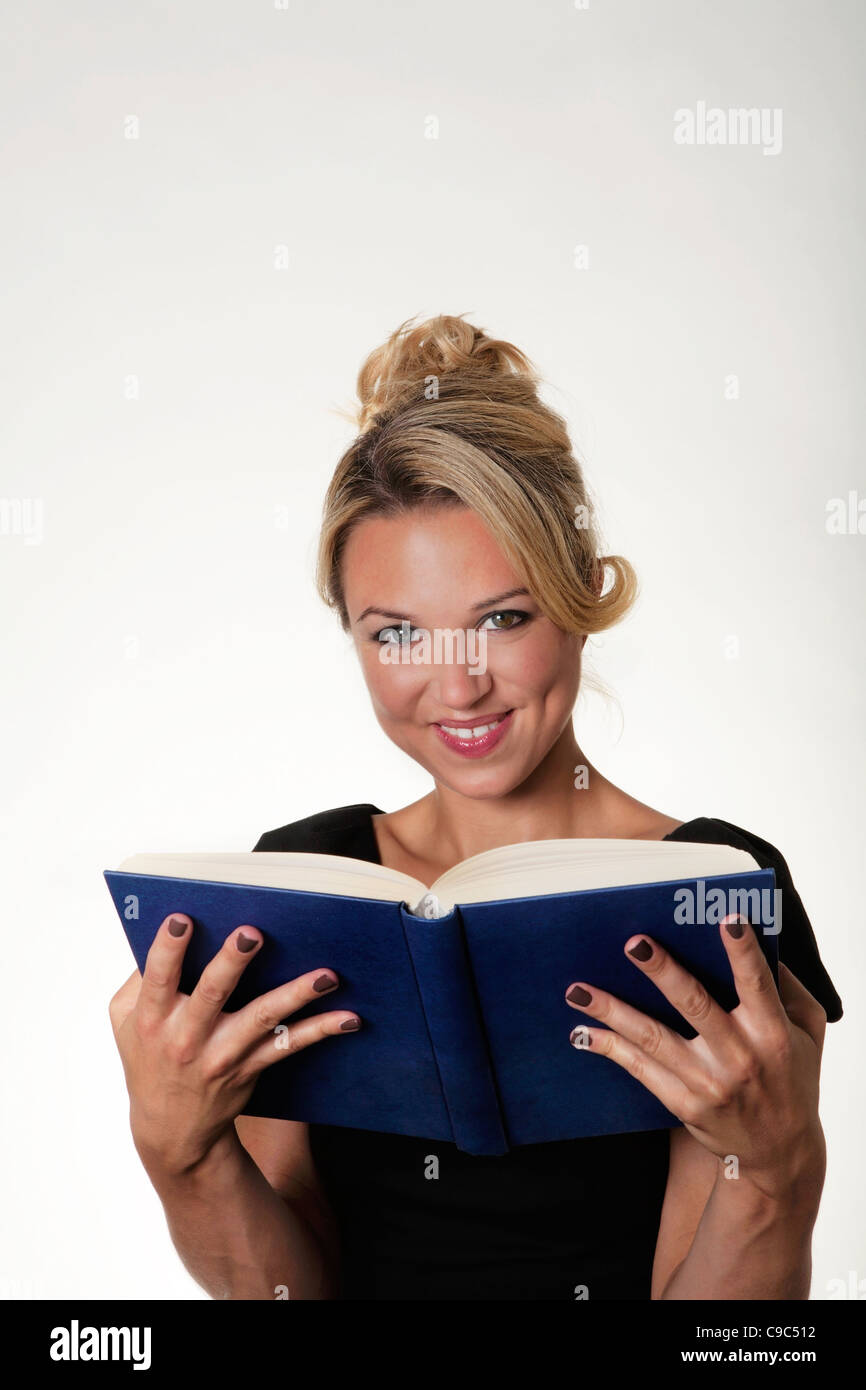 woman read a hard hard book Stock Photo - Alamy