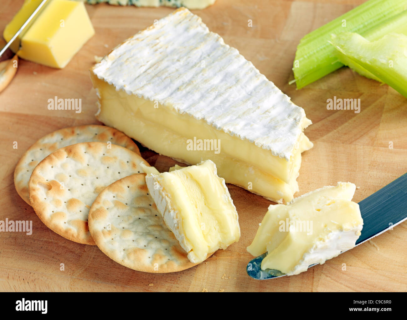 Ripe Brie on a cheeseboard Stock Photo - Alamy