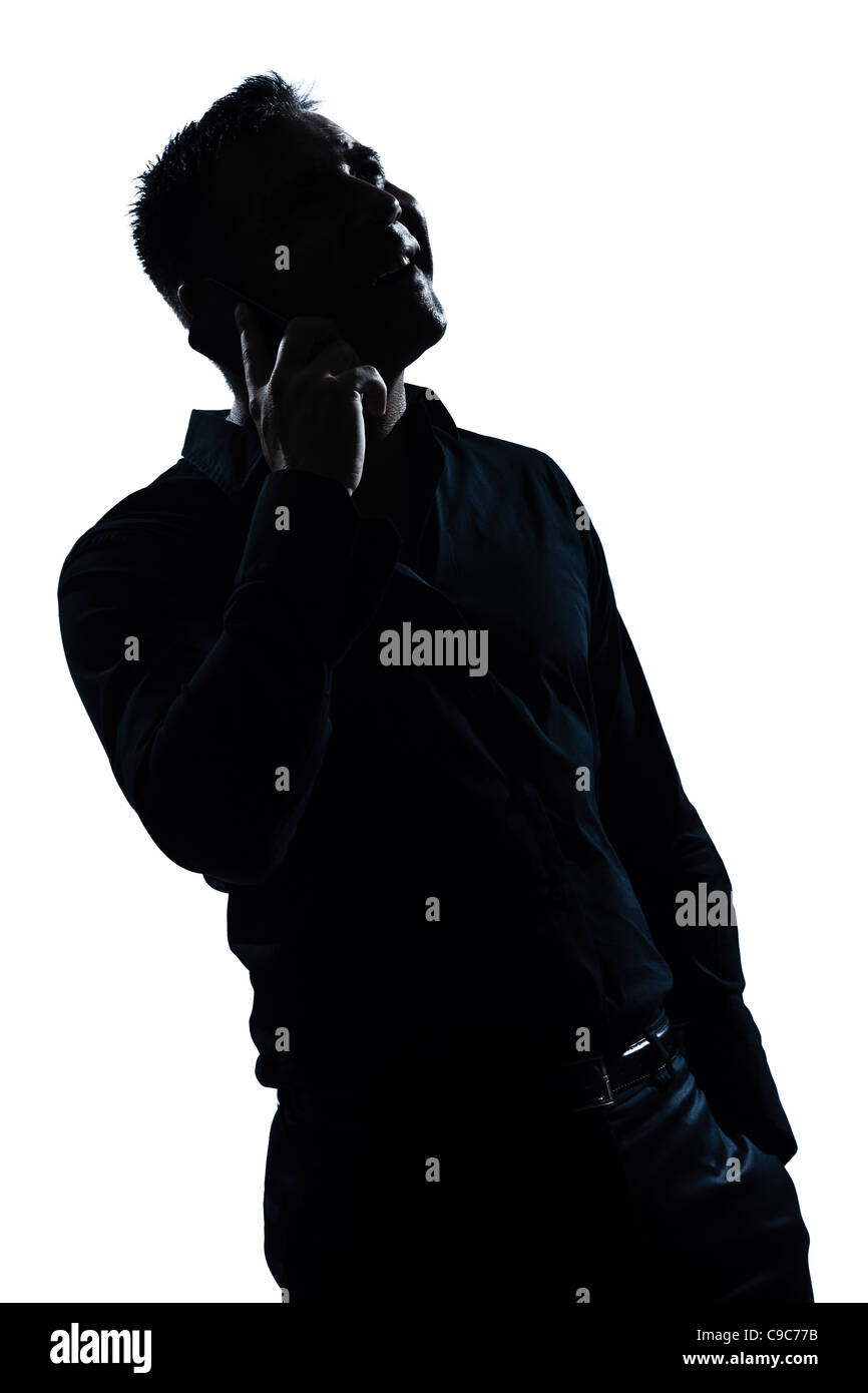 one man happy telephone portrait silhouette in studio isolated white ...