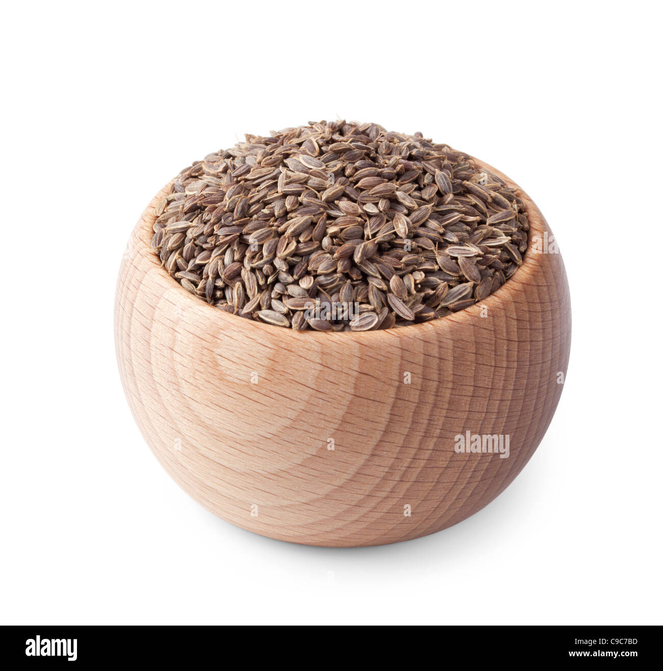 Wooden bowl full of dill seeds isolated on white background Stock Photo ...