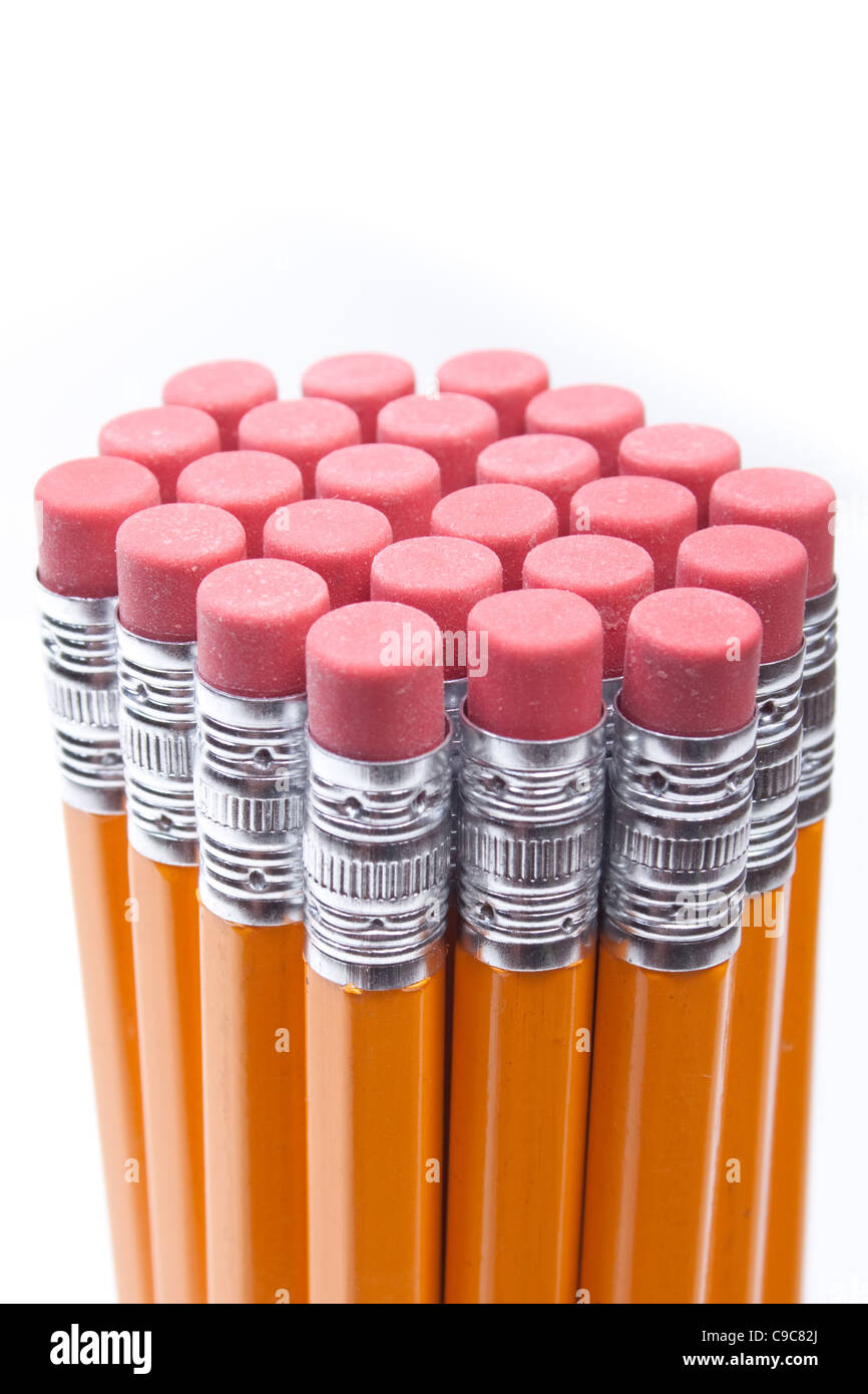 Pencils and erasers against a white background Stock Photo - Alamy