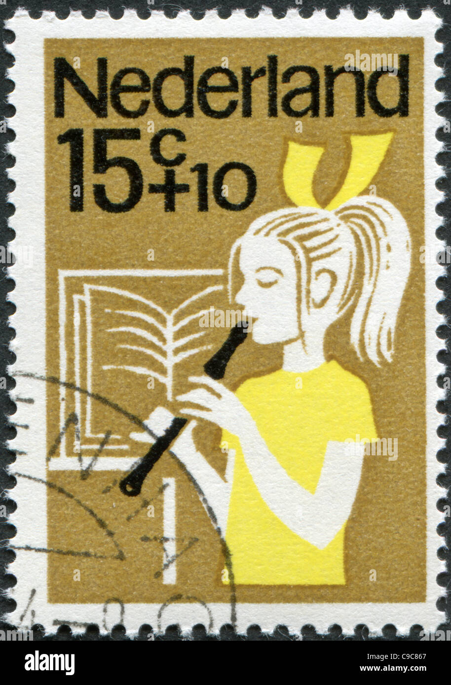 NETHERLANDS - 1964: A stamp printed in the Netherlands, shows a girl ...