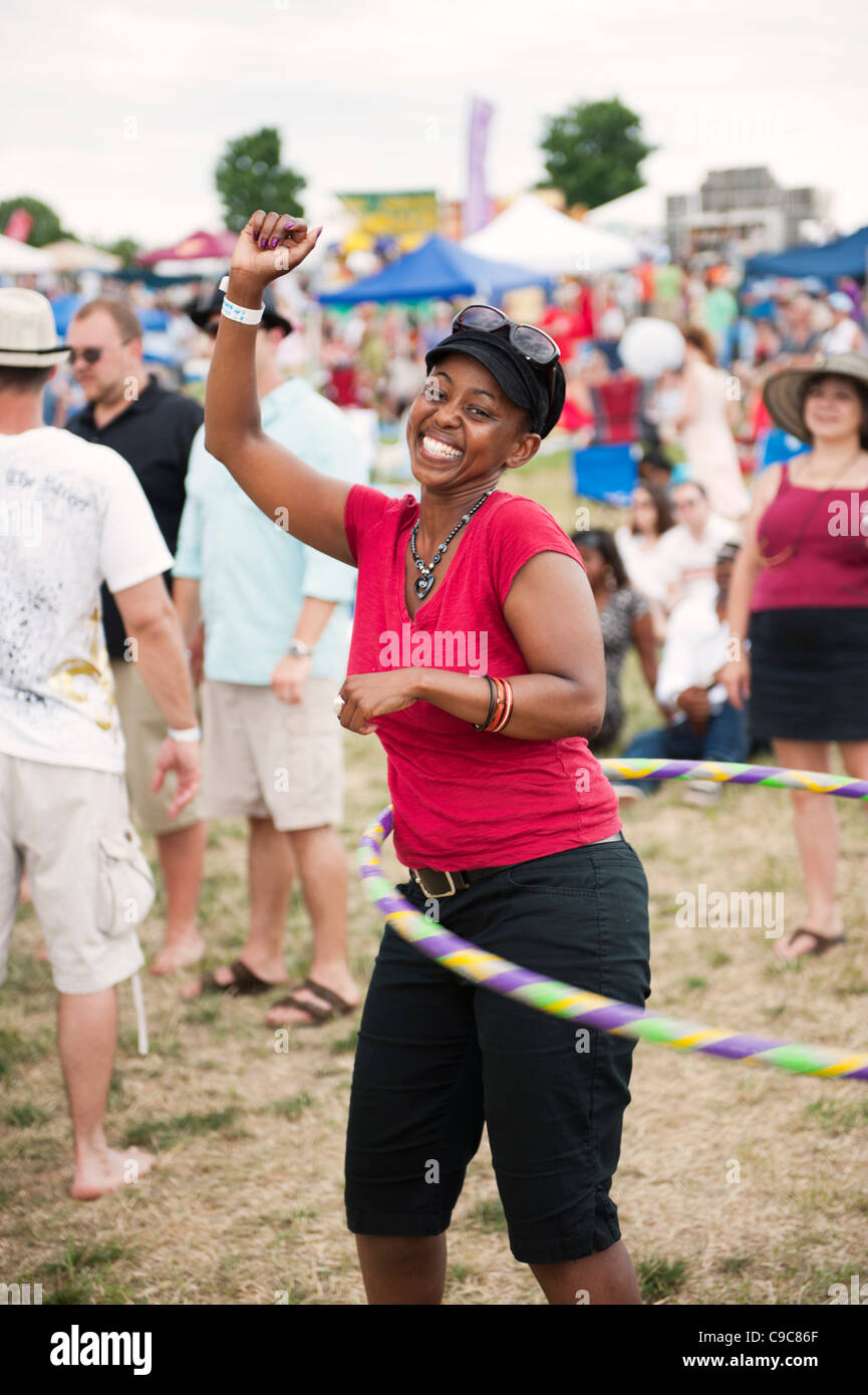 A young lady hula hoops happily at the "Vintage Virginia Wine Festival ...