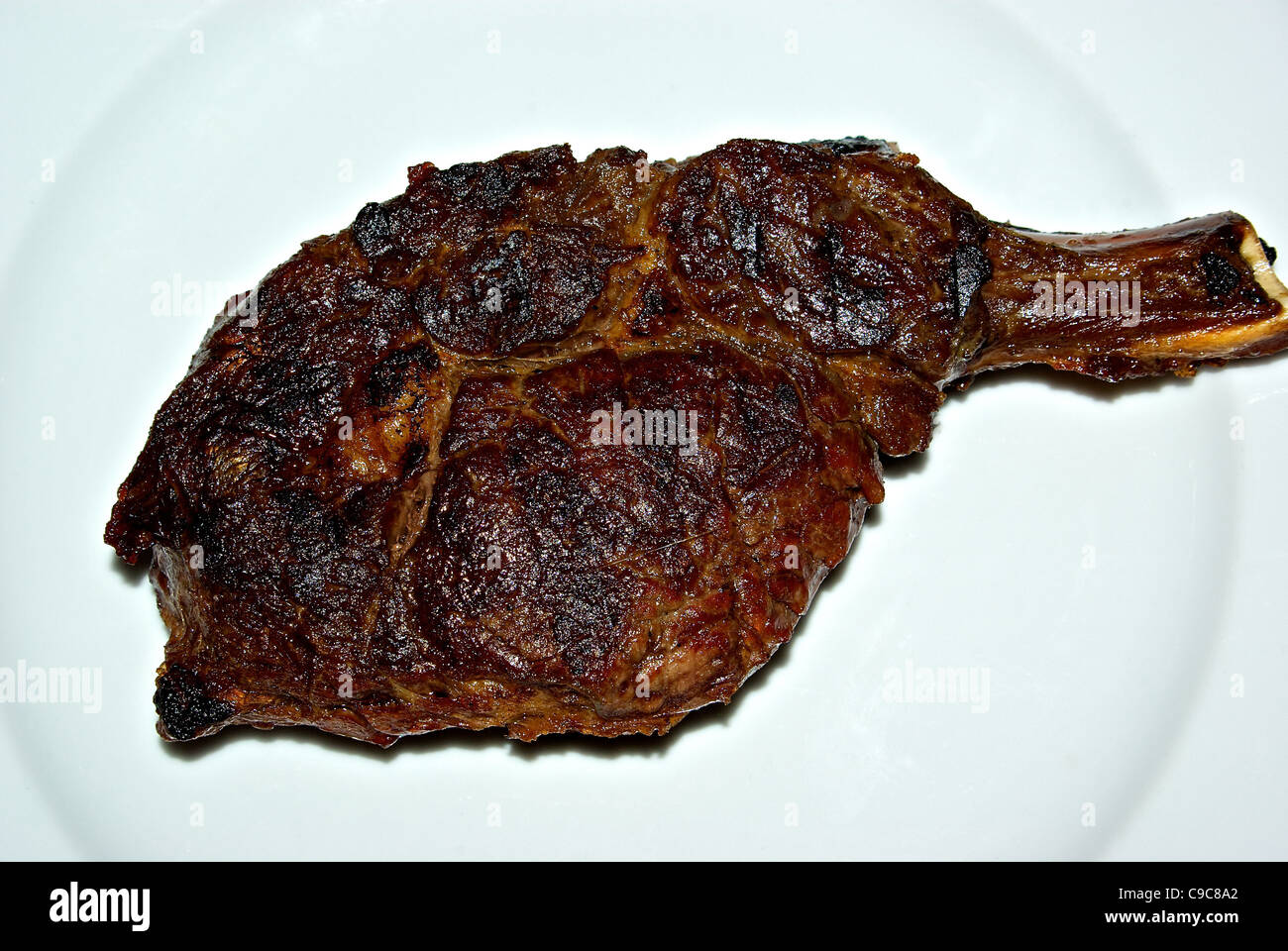 Thick pan seared dry aged Savannah Angus rib eye steak on bone Stock ...