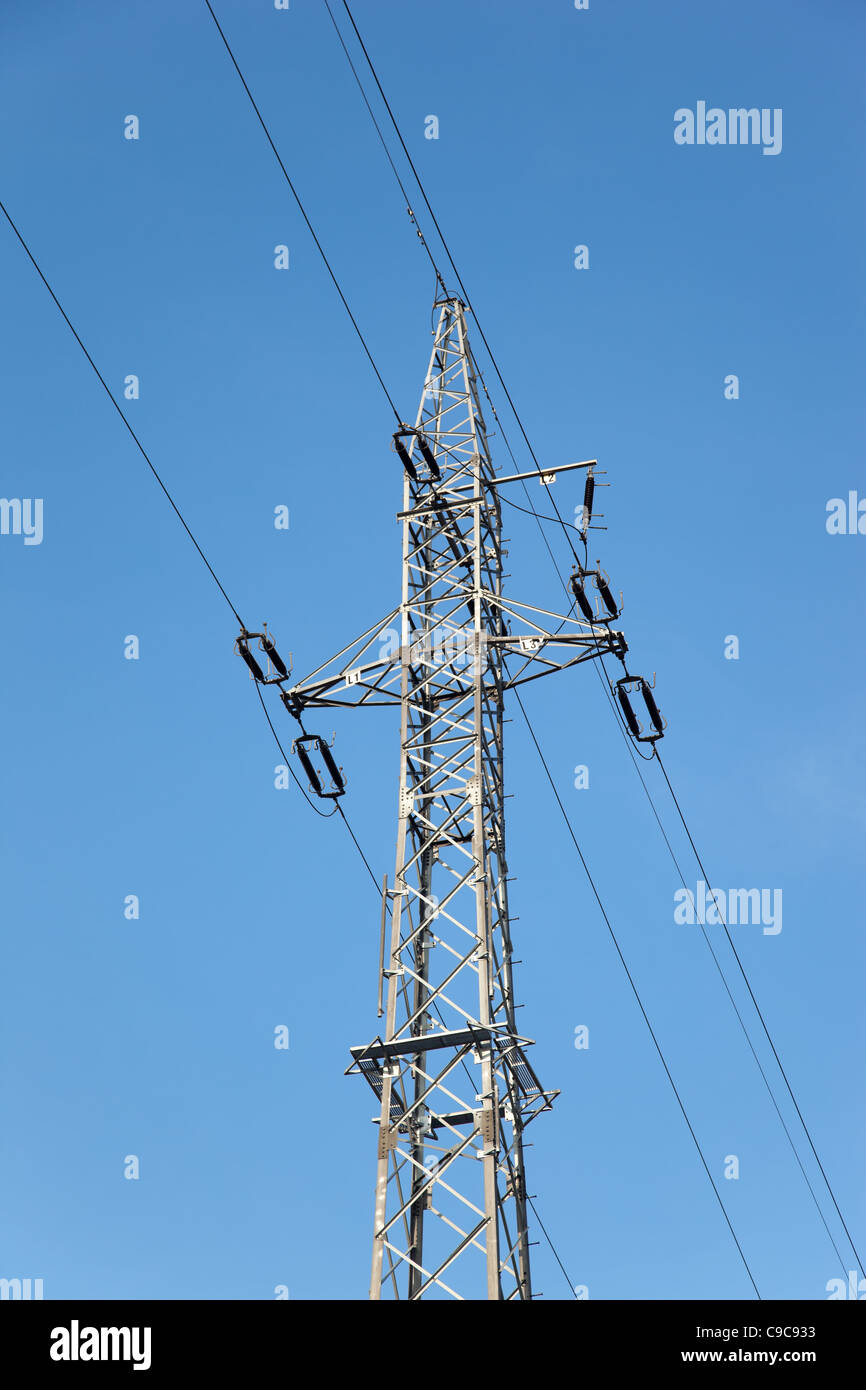 Electric high voltage power post Stock Photo - Alamy