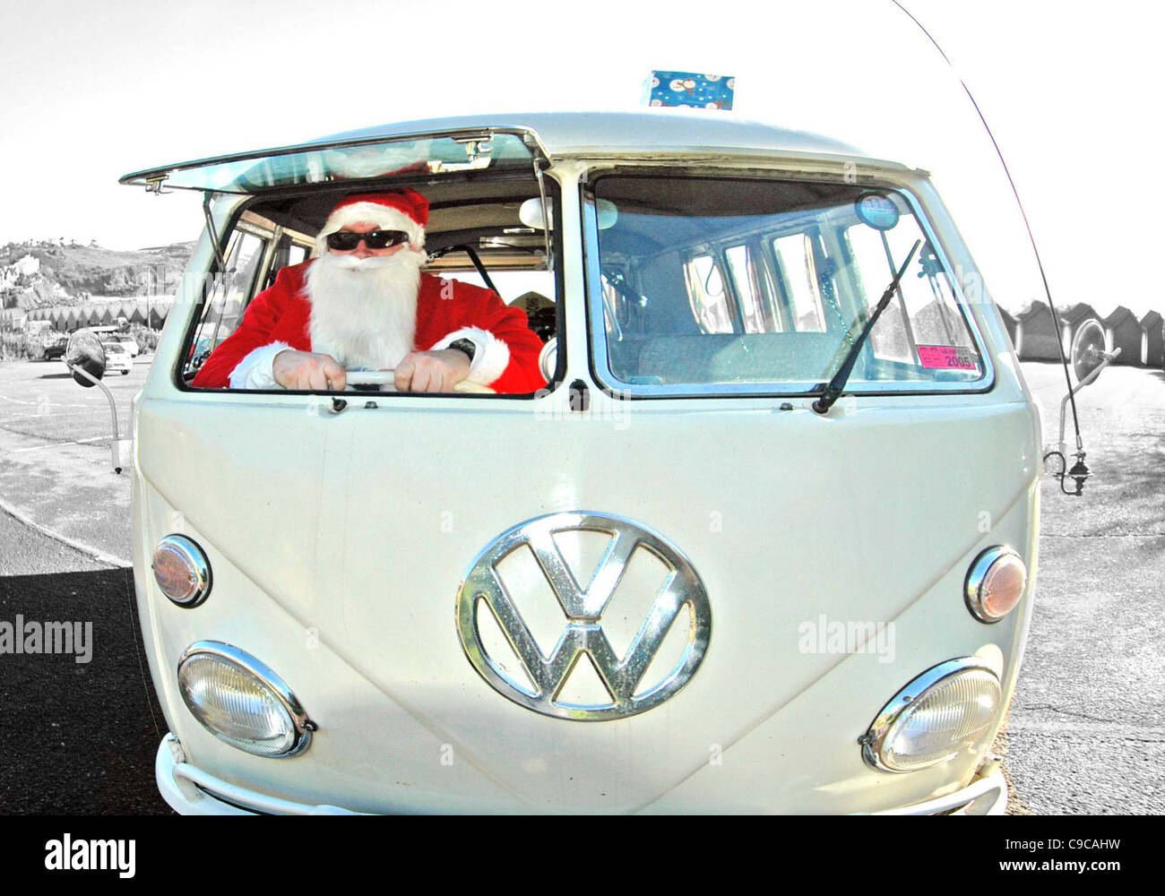 Santa claus looking through window hi-res stock photography and images ...
