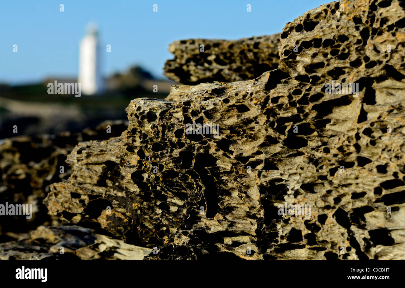 Godrevy lighthouse with rock formation Stock Photo - Alamy