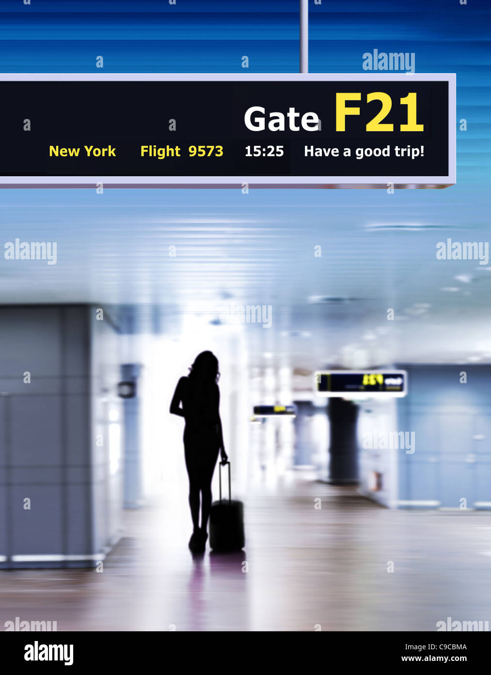 tourist info signage in airport and silhouette of passenger Stock Photo ...