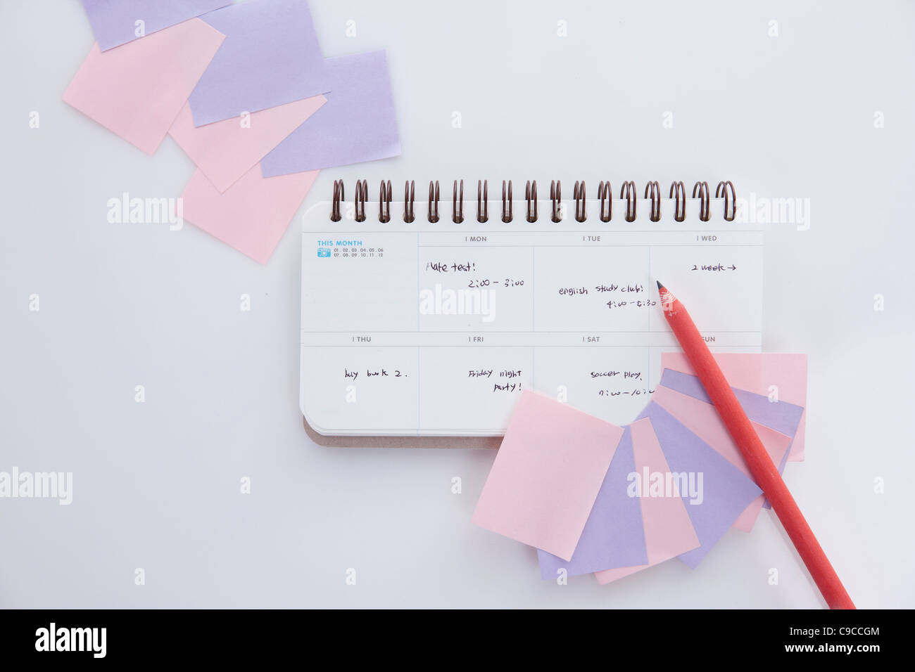 Post its and a diary with notes Stock Photo - Alamy