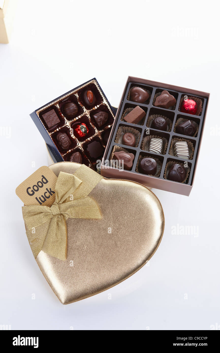 Boxes of chocolates and a good luck message Stock Photo - Alamy
