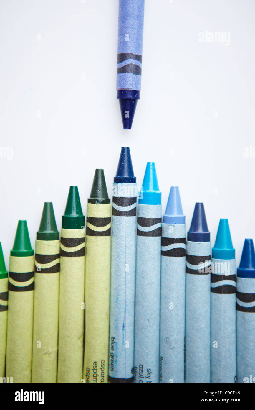 Many crayons in green and blue tone arrayed Stock Photo - Alamy