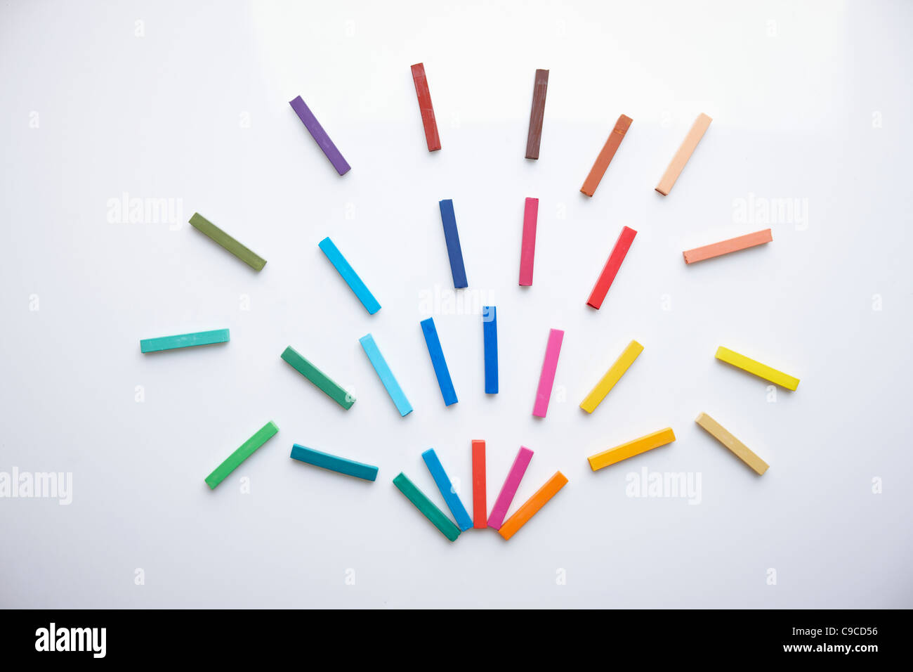 Various colors of pastels spreaded out Stock Photo - Alamy