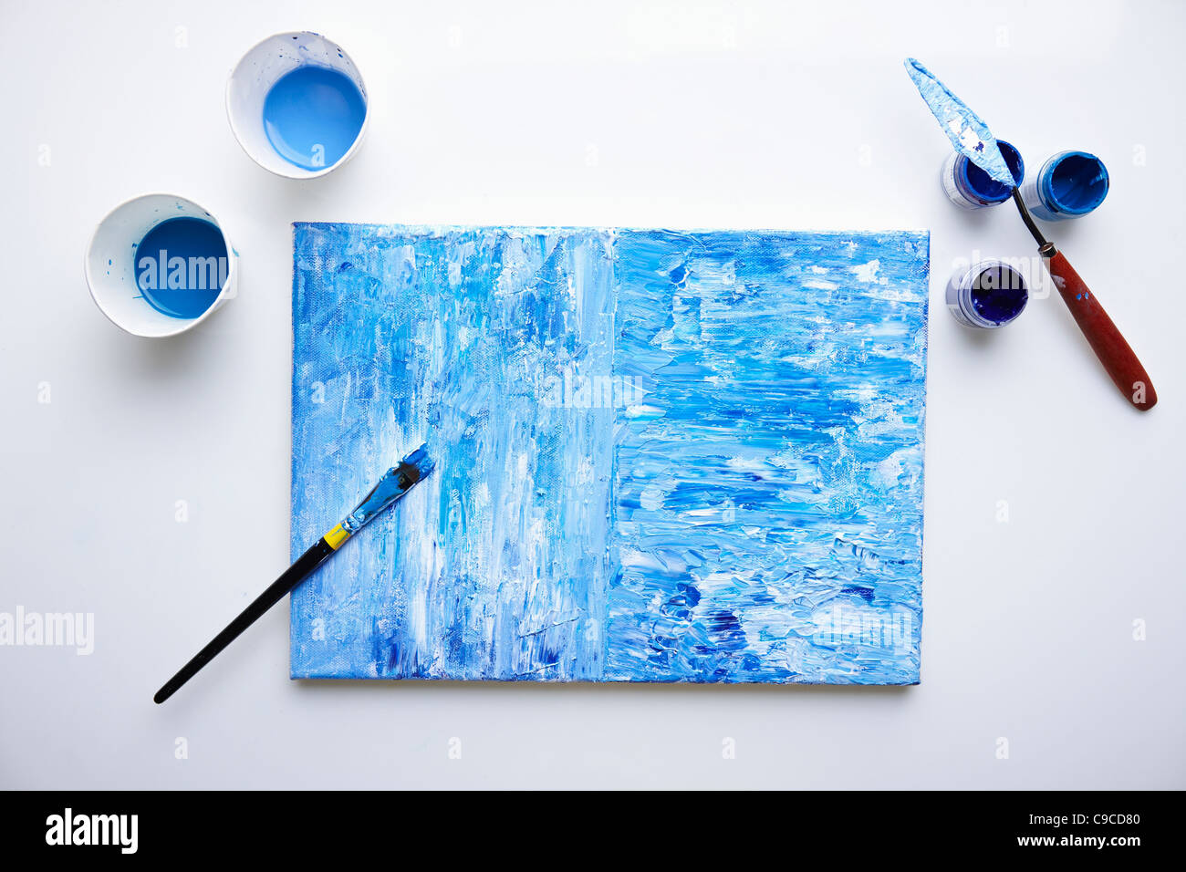 Horizontal and vertical paints on canvas in blue tone Stock Photo - Alamy