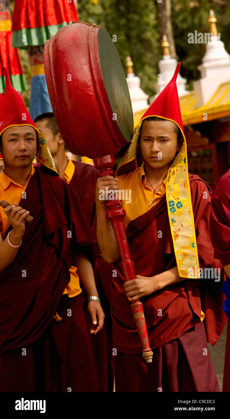 India, South Asia, Sikkim, Buddhist Monk playing a drum in a Losar ...