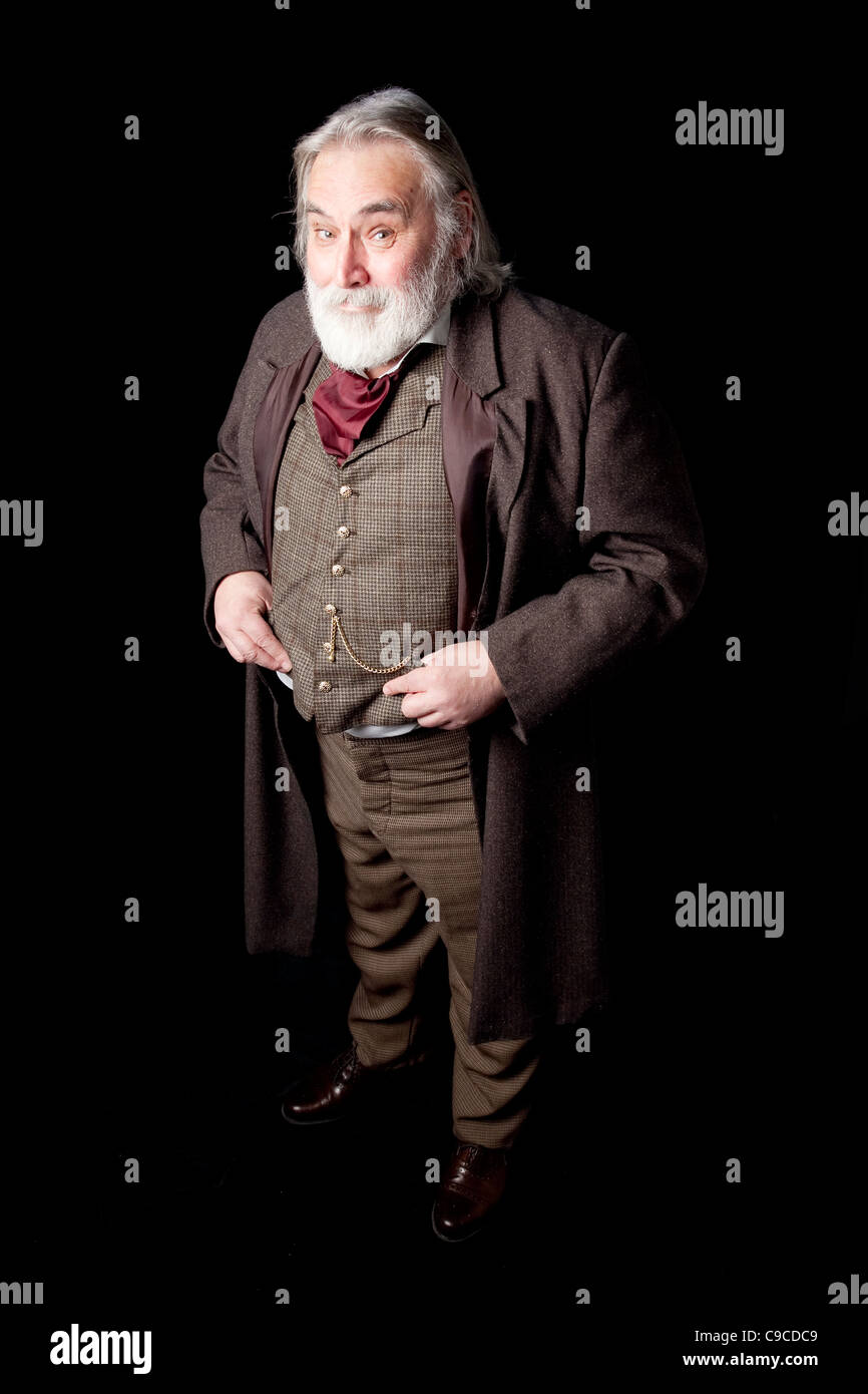 Charles Dickens actor on stag Stock Photo - Alamy