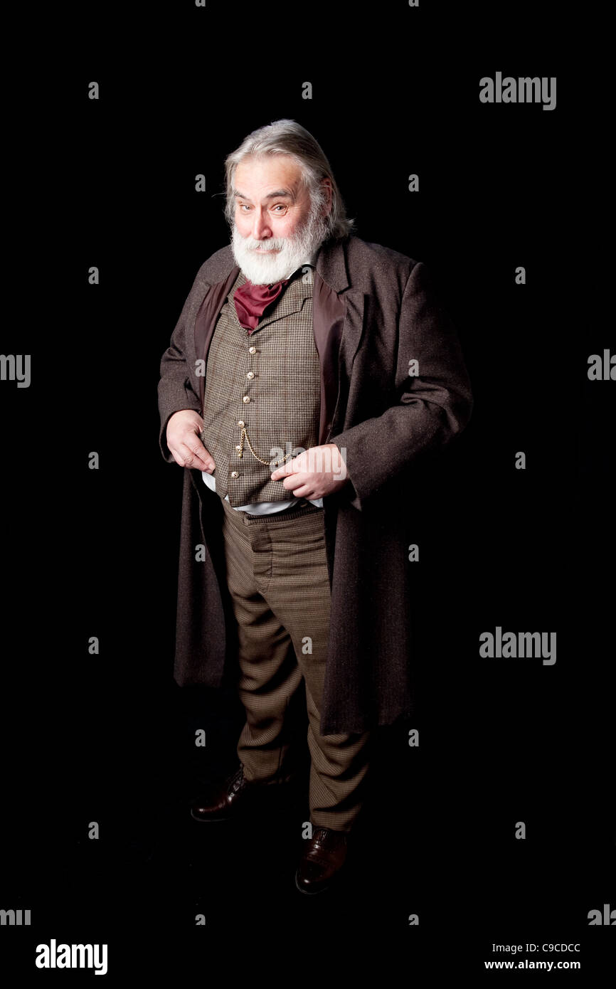 Charles Dickens actor on stag Stock Photo - Alamy
