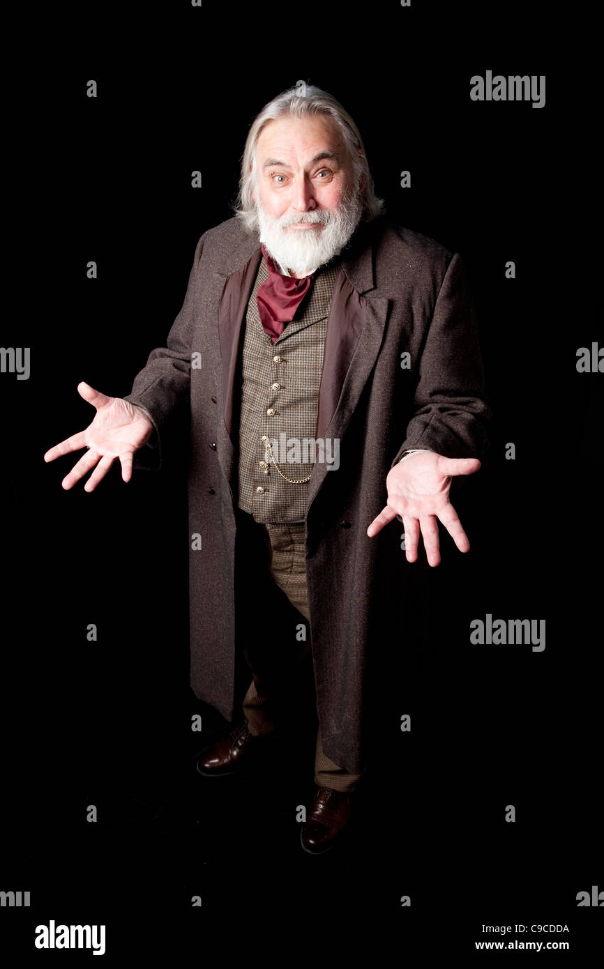 Charles Dickens actor on stag Stock Photo - Alamy