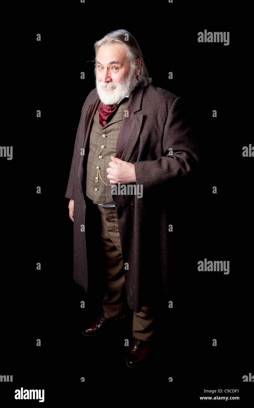 Charles Dickens actor on stag Stock Photo - Alamy