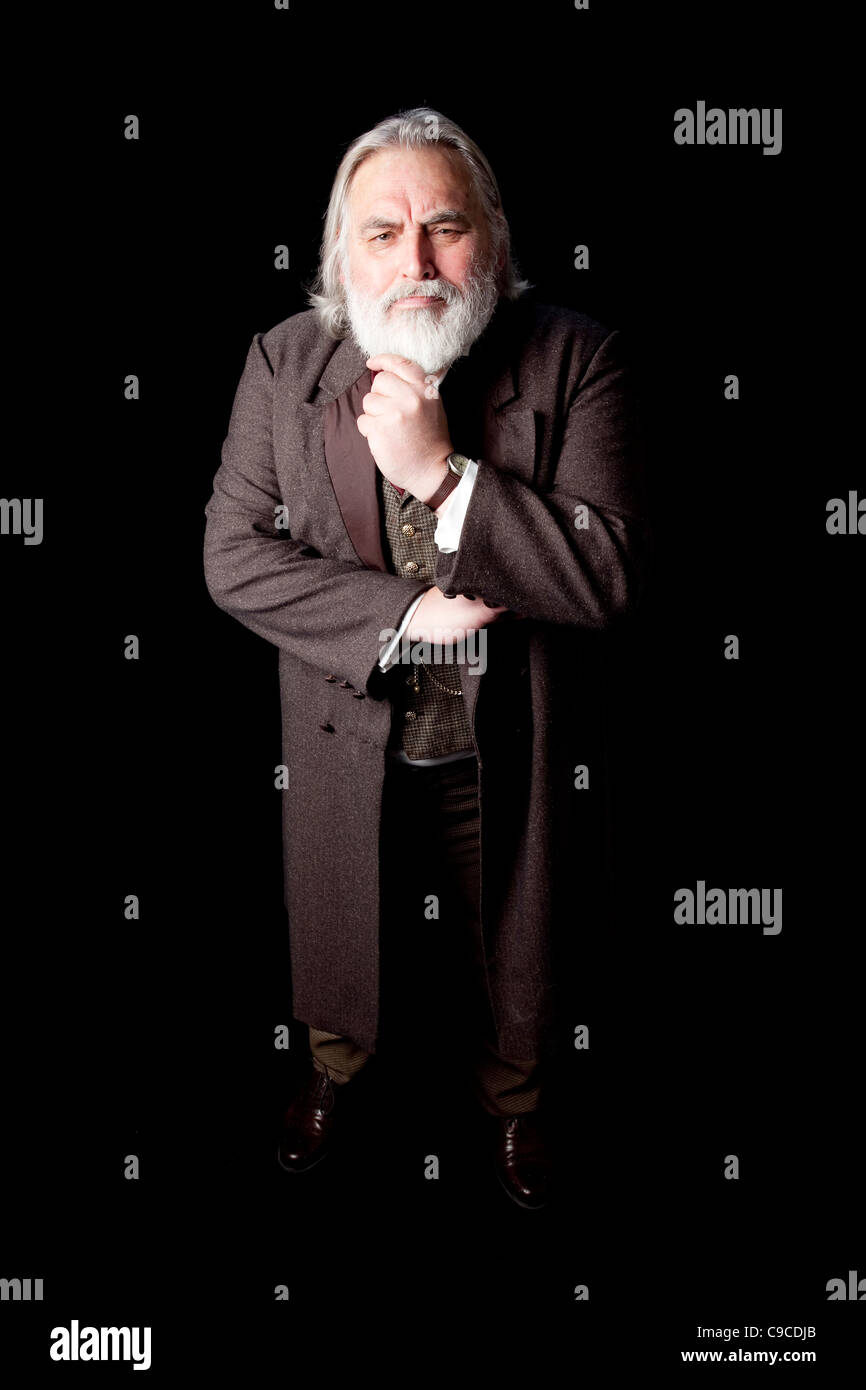 Charles Dickens actor on stag Stock Photo - Alamy