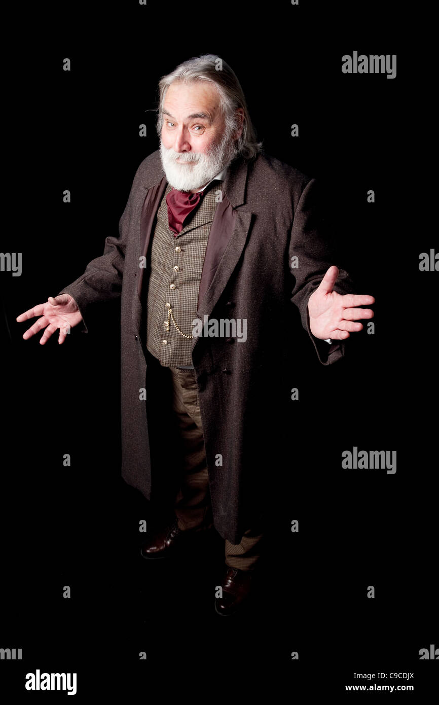 Charles Dickens actor on stag Stock Photo - Alamy