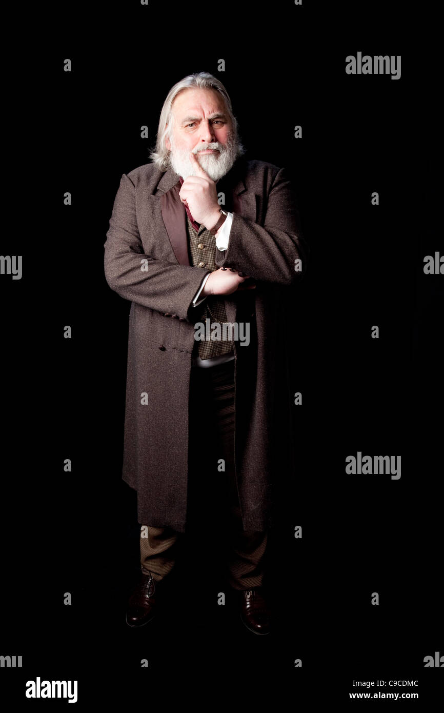 Charles Dickens actor on stag Stock Photo - Alamy