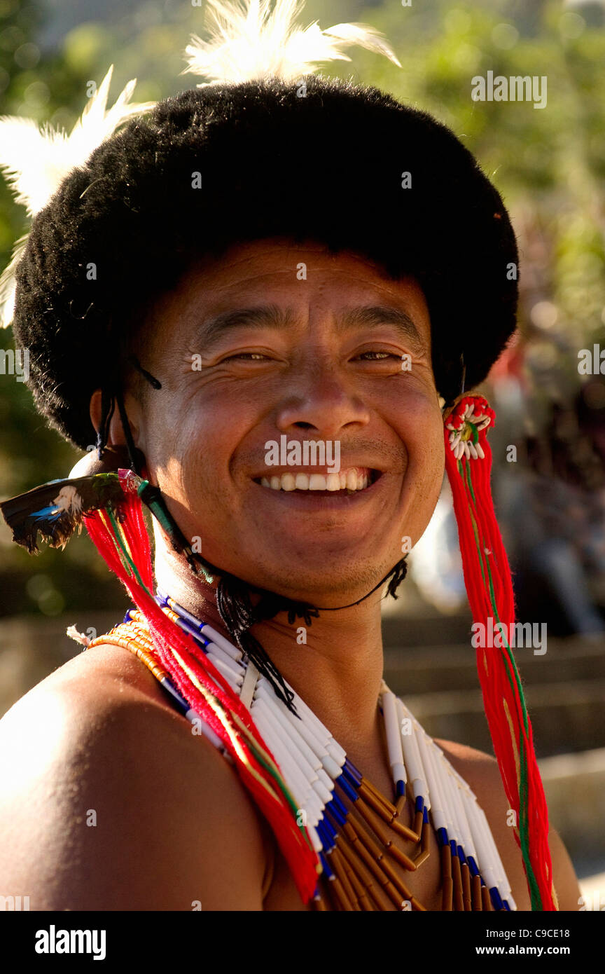 India, South Asia, Nagaland, Smiling Naga tribe Warrior in traditional ...