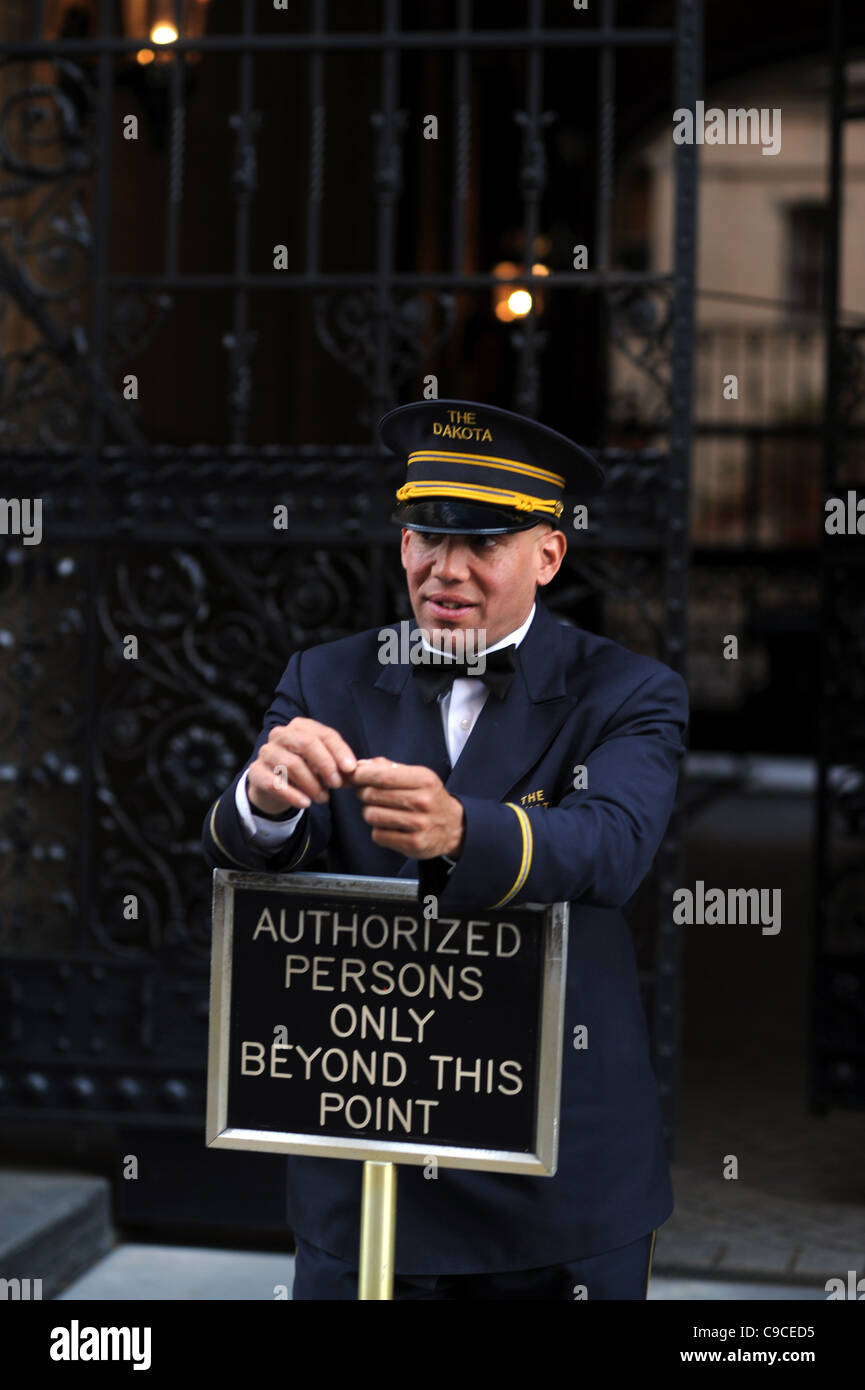 Security man or doorman concierge at entrance to Dakota Building by ...