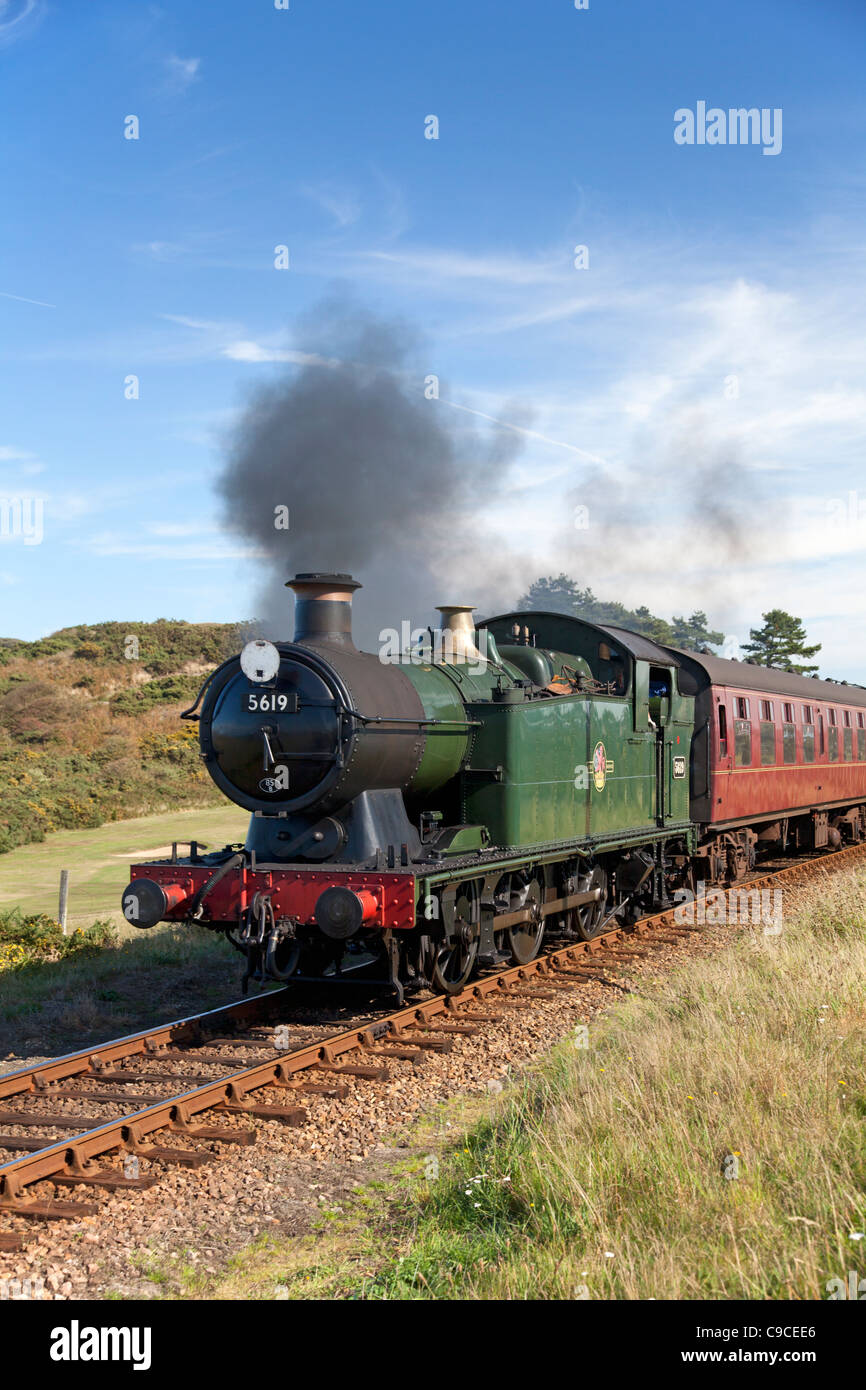 GWR 0-6-2T no. 5619 steams past Sheringham Golf Course with a train on ...