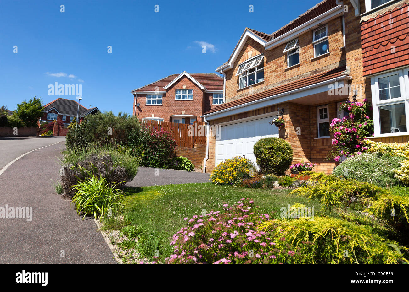 English house with garage, uk Stock Photo - Alamy