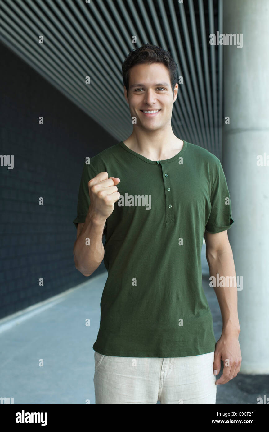 Holding up fist hi-res stock photography and images - Alamy