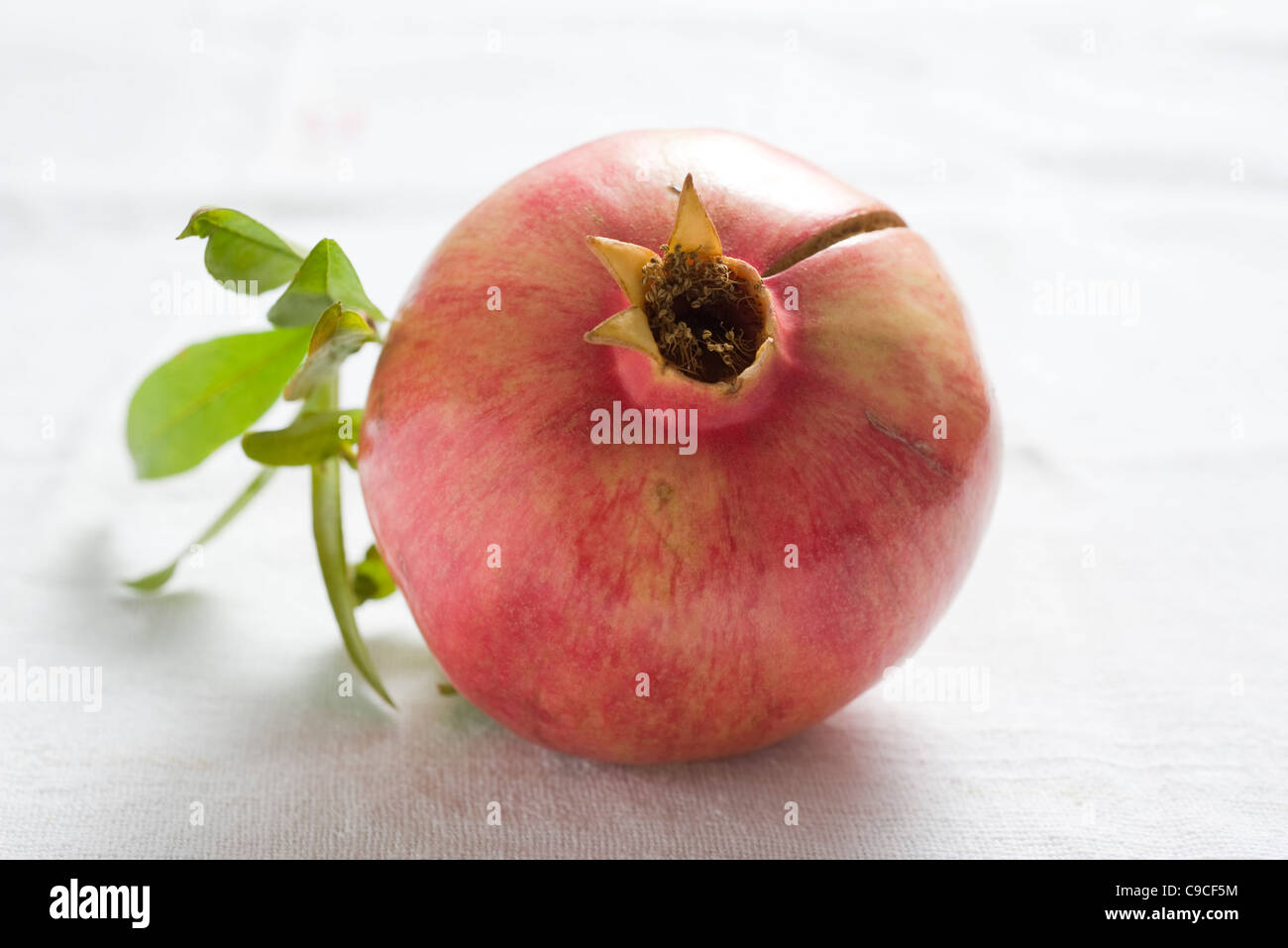 Cracked ripe pomegranate fruit on hi-res stock photography and images ...