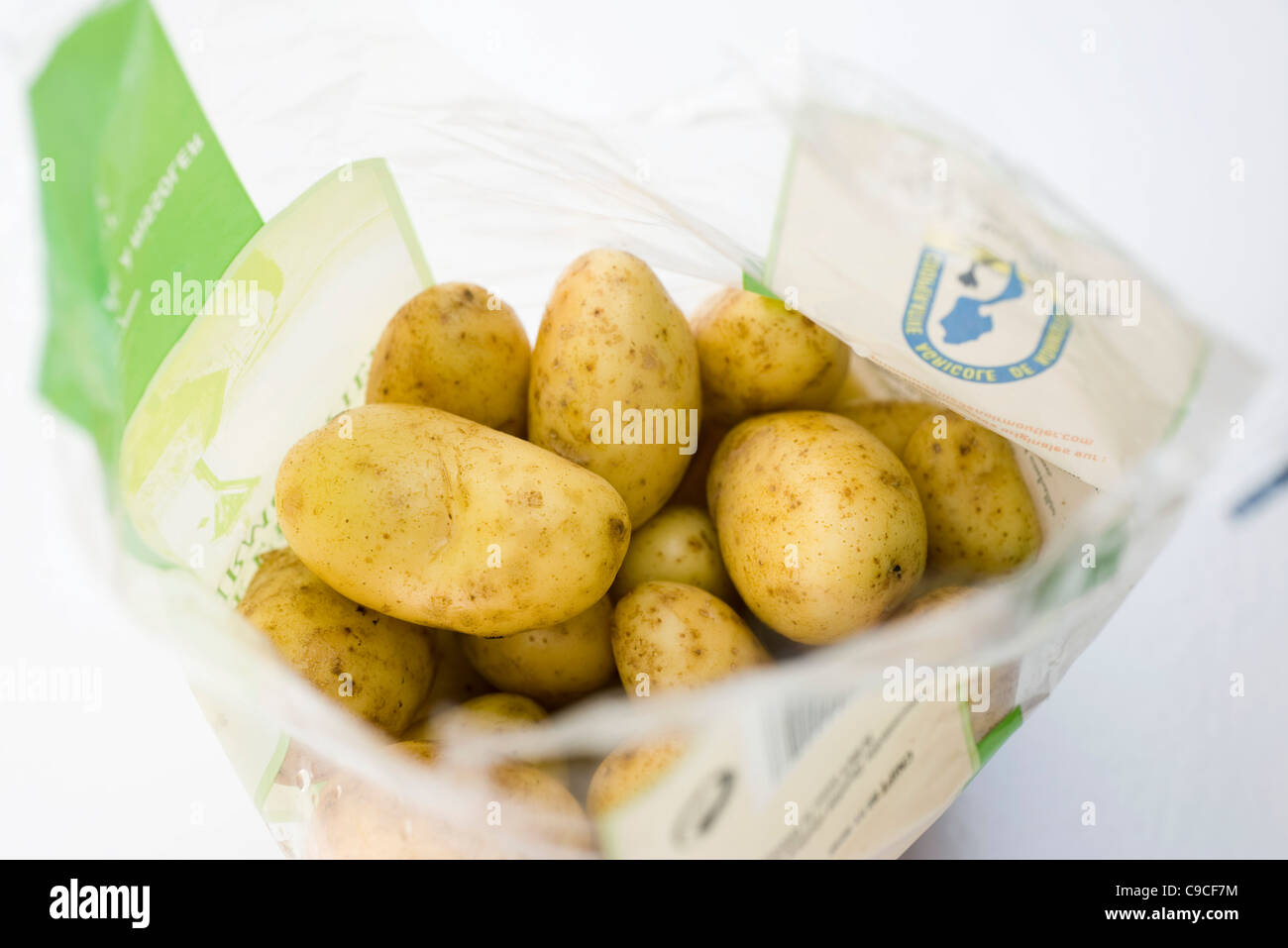 Bag of potatoes Stock Photo - Alamy
